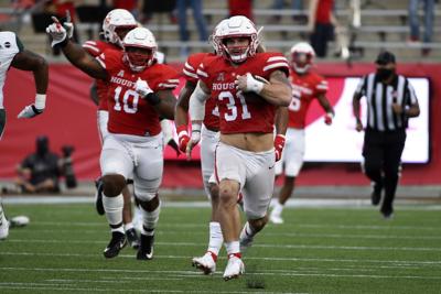 Tune, Houston hit high note in 56-21 blowout over S. Florida ...
