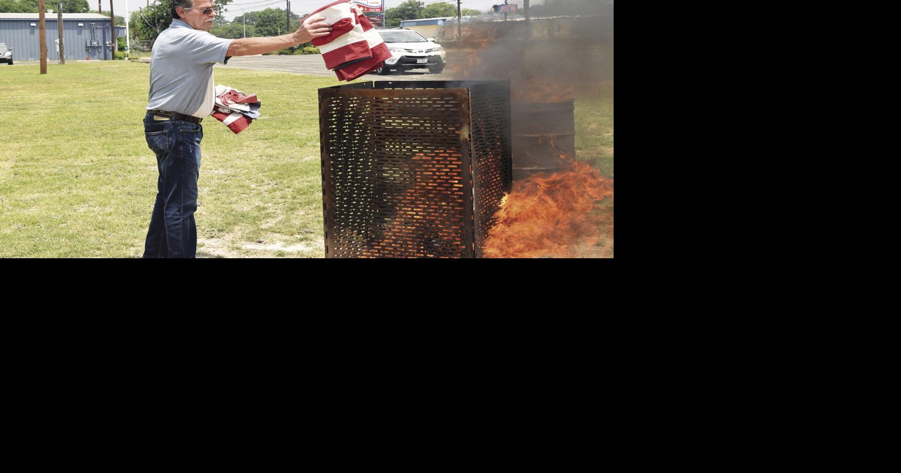 Worn and frayed flags retired honorably with flames | News | dailytimes.com