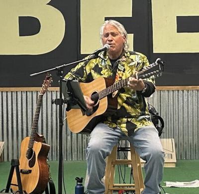 Local musician performs at Winters Farmers Market | Arts ...