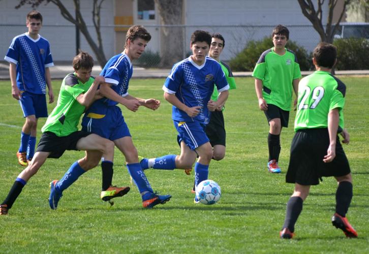 Sonia Sutton, Matthew Grabert and Nathan Leyva Blazers soccer and ...