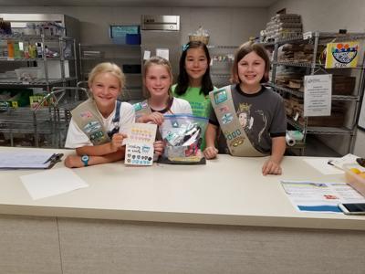 Junior Girl Scouts help STEAC families and individuals | Community News ...