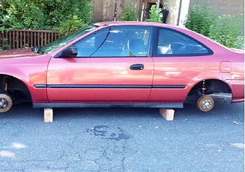 Cars up on blocks photos | Do-not-import | davisenterprise.com