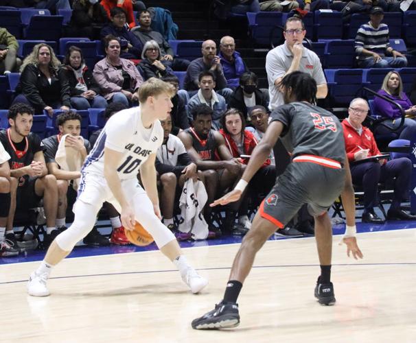 Basketball: UC Davis men too much for Holy Names | Aggies ...