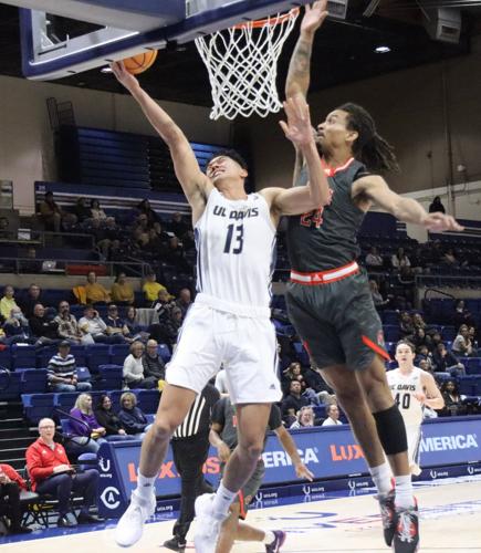 Basketball: UC Davis men too much for Holy Names | Aggies ...