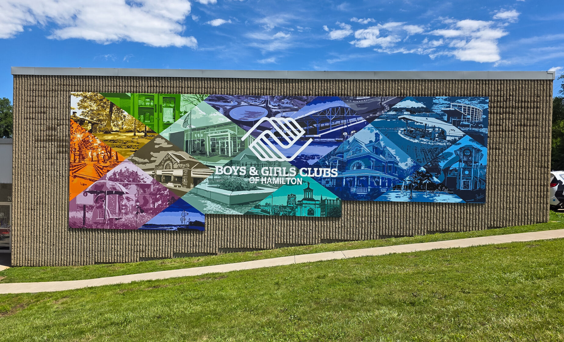 Community-painted mural unites all 17 Hamilton neighborhoods on Boys ...
