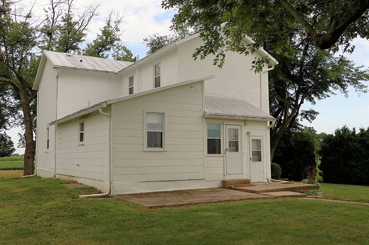Farmhouse, barn, 4-car garage set on 2.4 acres | Homes ...
