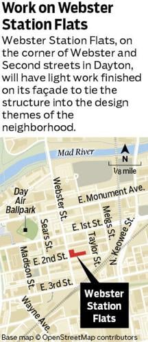 City tells new Dayton apartments with black and red facade to update ...