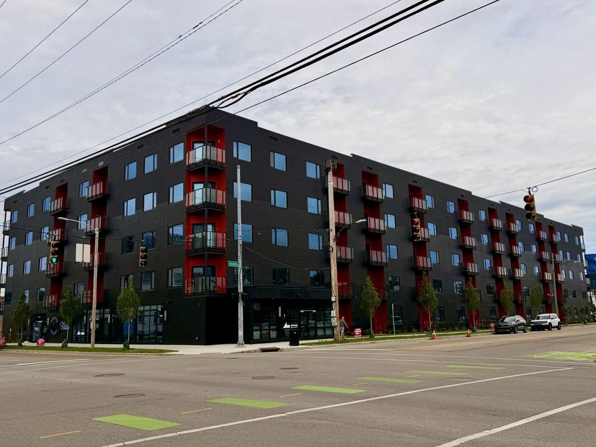 City tells new Dayton apartments with black and red facade to update ...