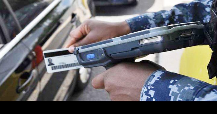 Access Granted: Scanners verify credentials before allowing entry ...