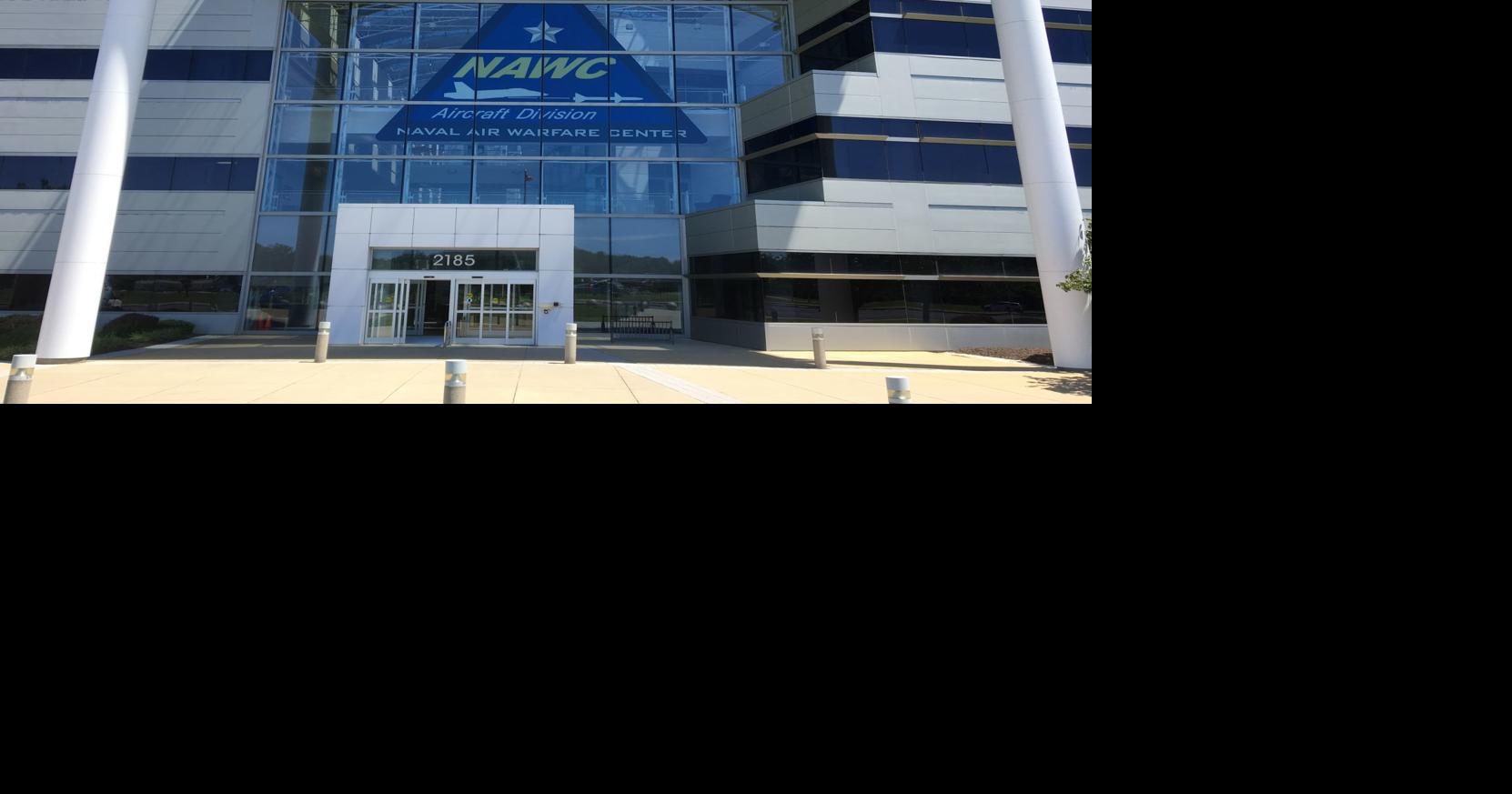 NAWCAD increases visibility with two-story tall logo installation ...