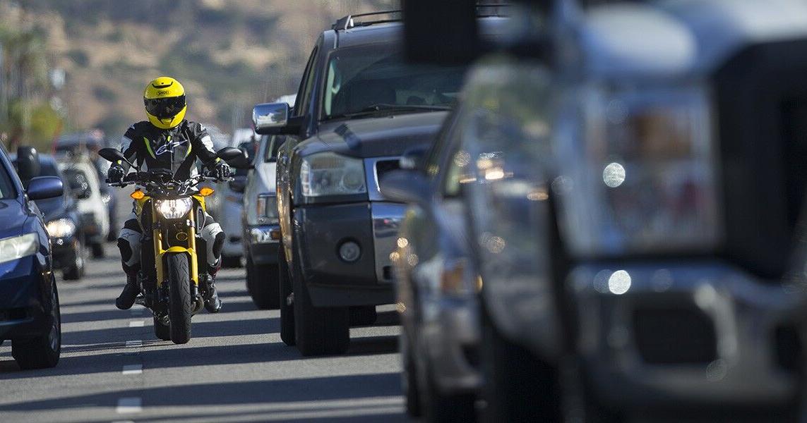 Lane splitting versus lane filtering — one is legal in Arizona | News ...