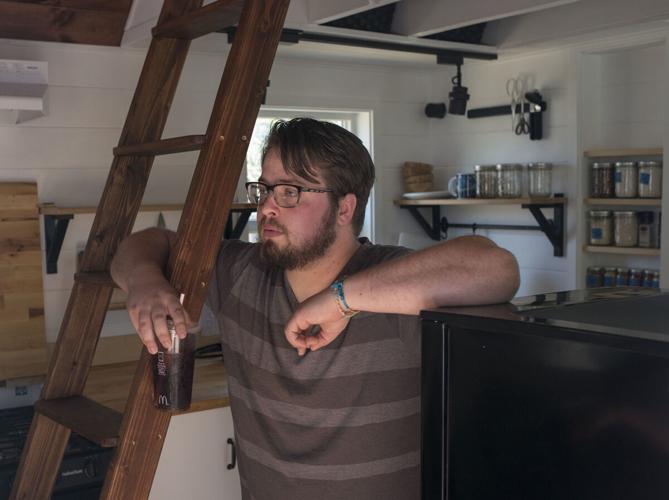 Man builds own tiny house to avoid high rent | Odd & Interesting ...