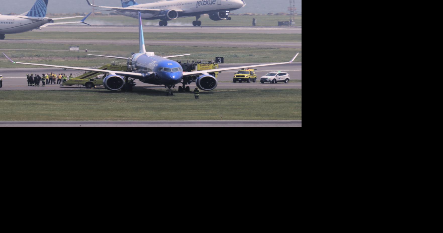 JetBlue flight from Chicago rolls off runway and into grass in Boston ...