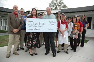 APS donates $10,000 to U.S. Vets for transitional housing | News ...