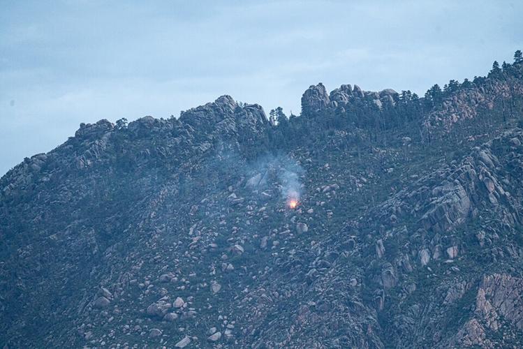 Firefighters monitoring lightning-caused fire on Granite Mountain ...