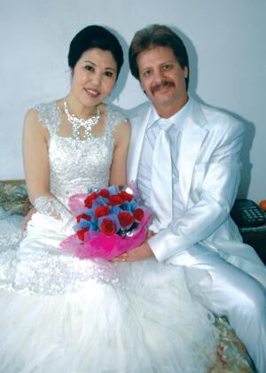 Wedding: Robbie Stobbs and Shen GuiFu | Life | dcourier.com