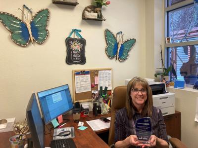 AAEC homeless liaison earns top state award for serving students in ...