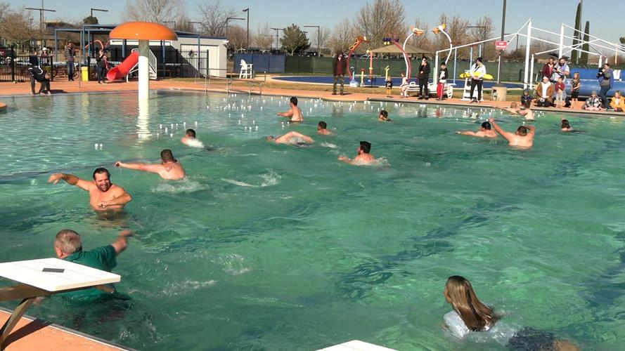 Hearty swimmers take the plunge at Prescott Valley Polar Bear Splash ...