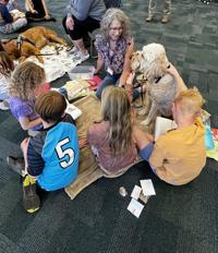 Dogs make for perfect audience at new therapy-dog reading program at ...
