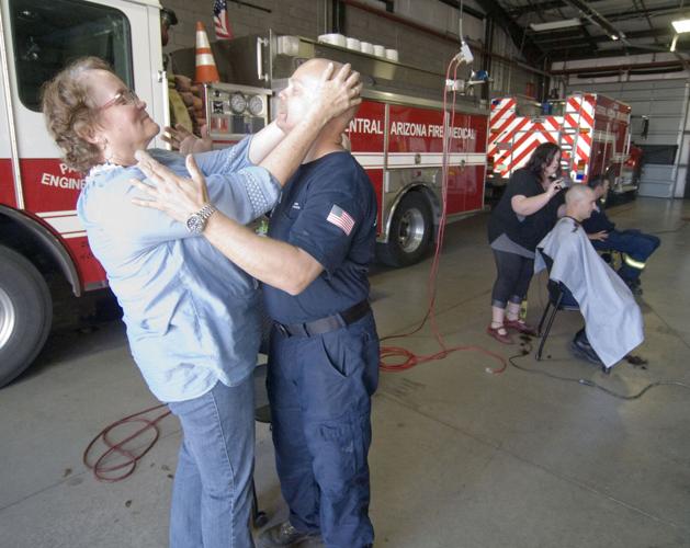 Firefighters shave their heads | Photo Galleries | dcourier.com