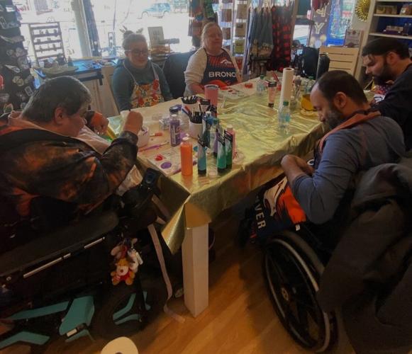 Local resident brings community together through her love for others and the arts; Julie Grimm ...