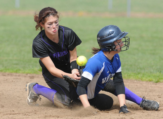 Prep softball: Warriors take two from Lions