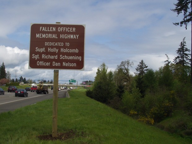 Third roadside sign posted honoring fallen officers