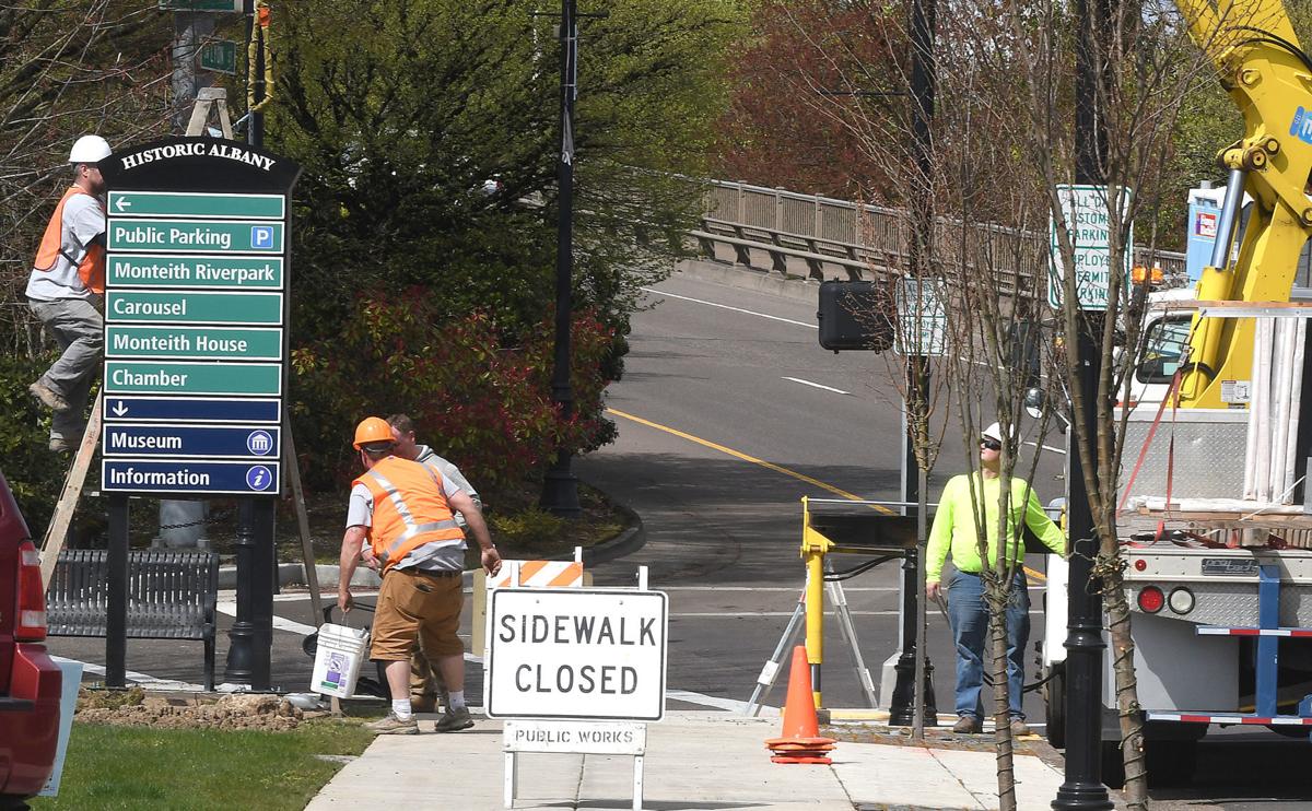 Gallery: Installing new Welcome to Albany Signs