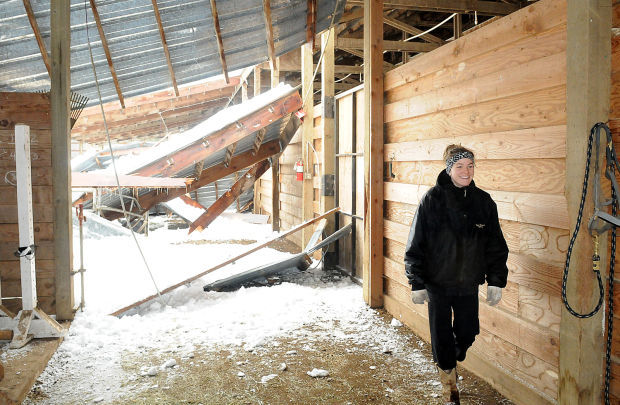 Snow weighs heavily on area: Collapsed structures, crashes and outages