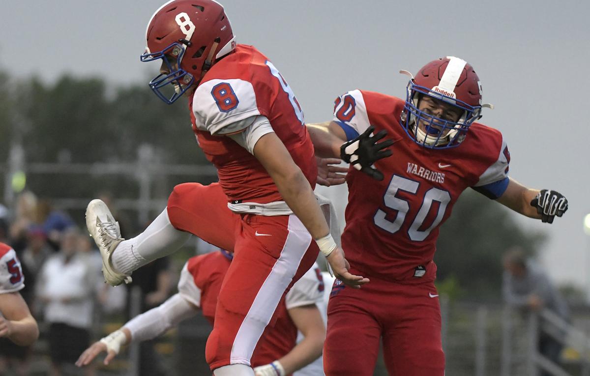 Prep football: Warriors suffocate Jackson, Marist | Football ...