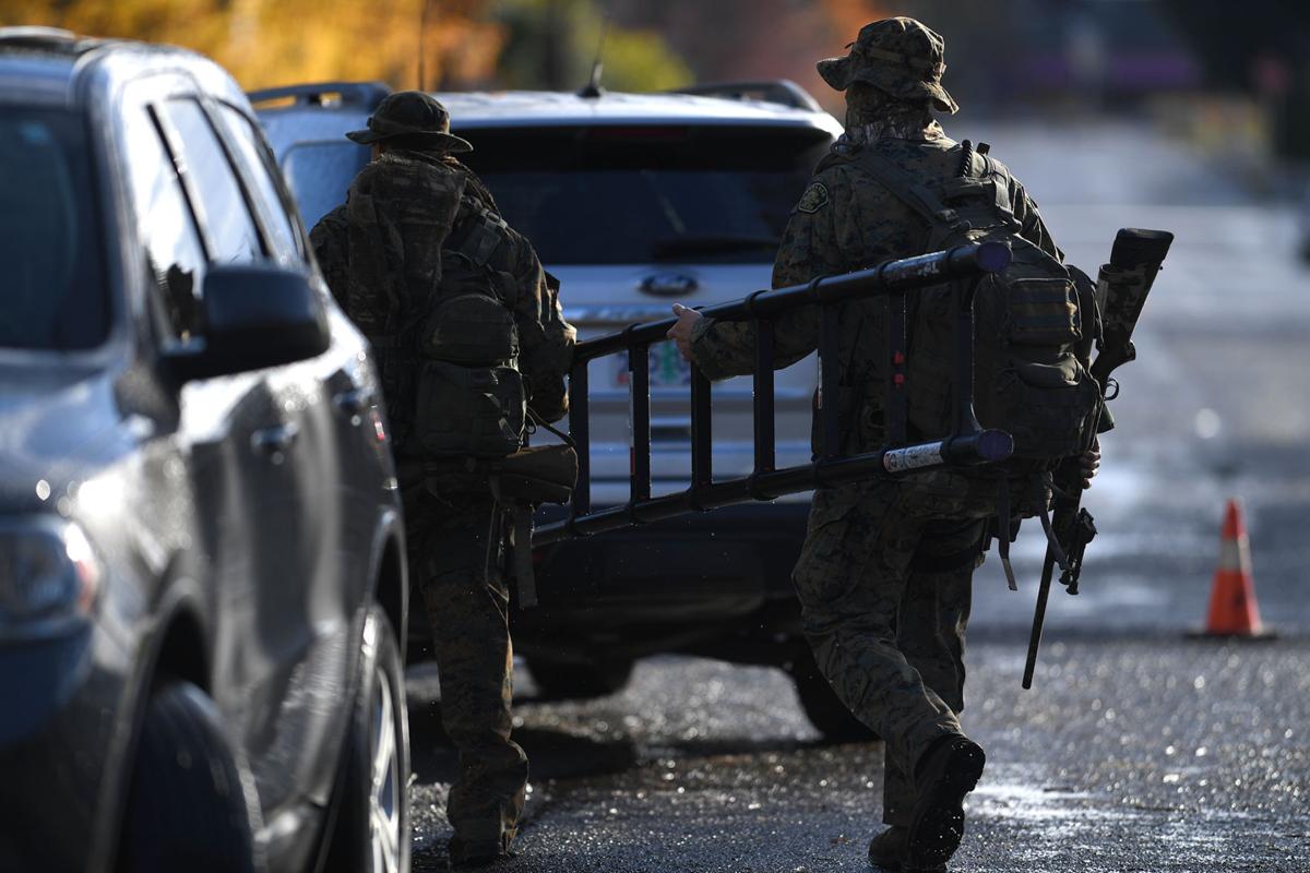 SWAT team compels barricaded suspect to surrender | Crime and Courts ...