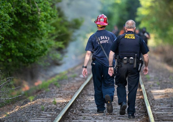 Firefighters battle North Albany brush fire after reported explosion