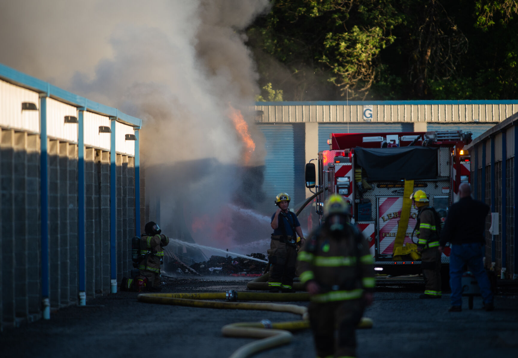two-alarm blaze draws six departments in storage unit fire