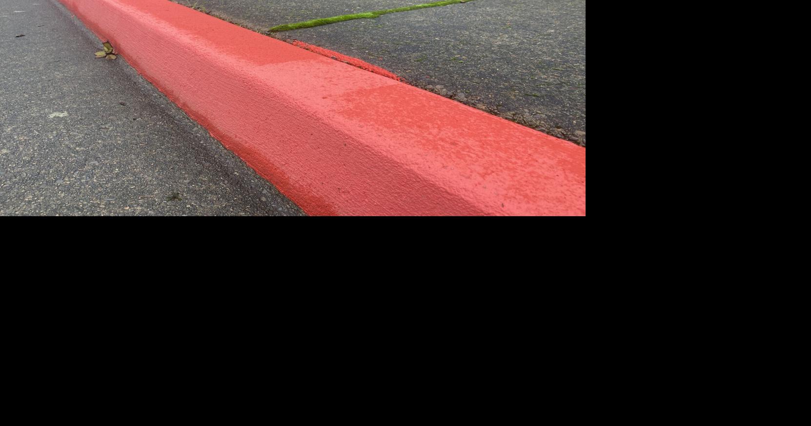 Brownsville's unsanctioned red curb to become drab gray again