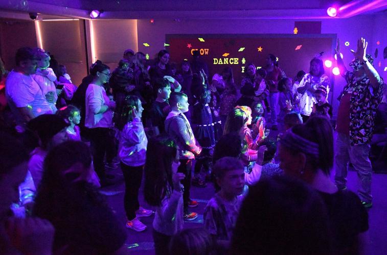 Balloons and black lights: Kids usher in New Year in festive fashion at ...