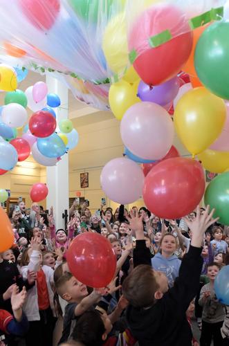 Balloons and black lights: Kids usher in New Year in festive fashion at ...