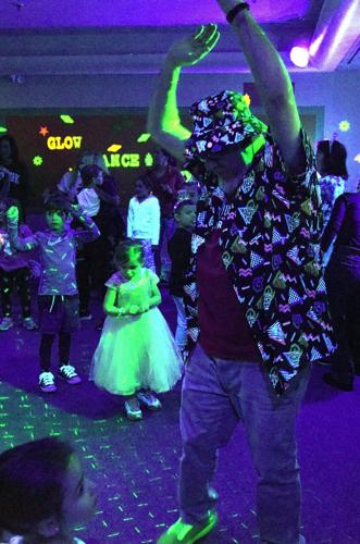 Balloons and black lights: Kids usher in New Year in festive fashion at ...