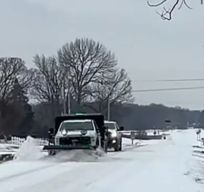 County and state roads still thick with ice three days after storm ...