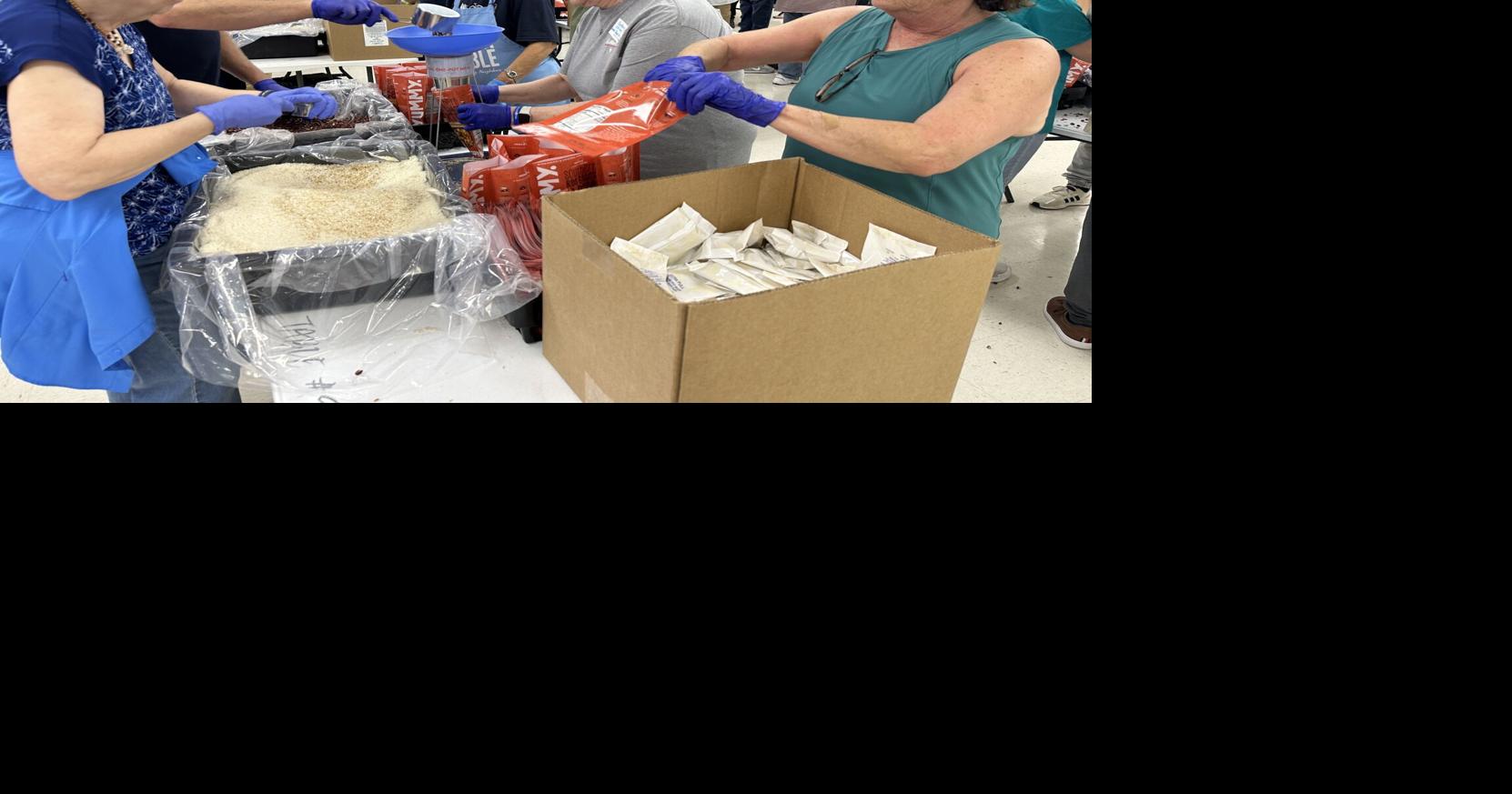 Volunteers gather to help pack 30,000 meals in Hernando | News ...