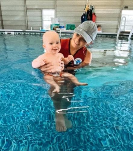 Aquatics instructor teaching infants how to survive in water | News | desototimes.com