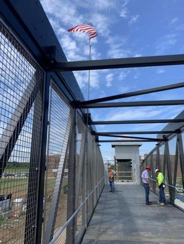 UPDATED: Snowden pedestrian bridge hoisted in place | News ...