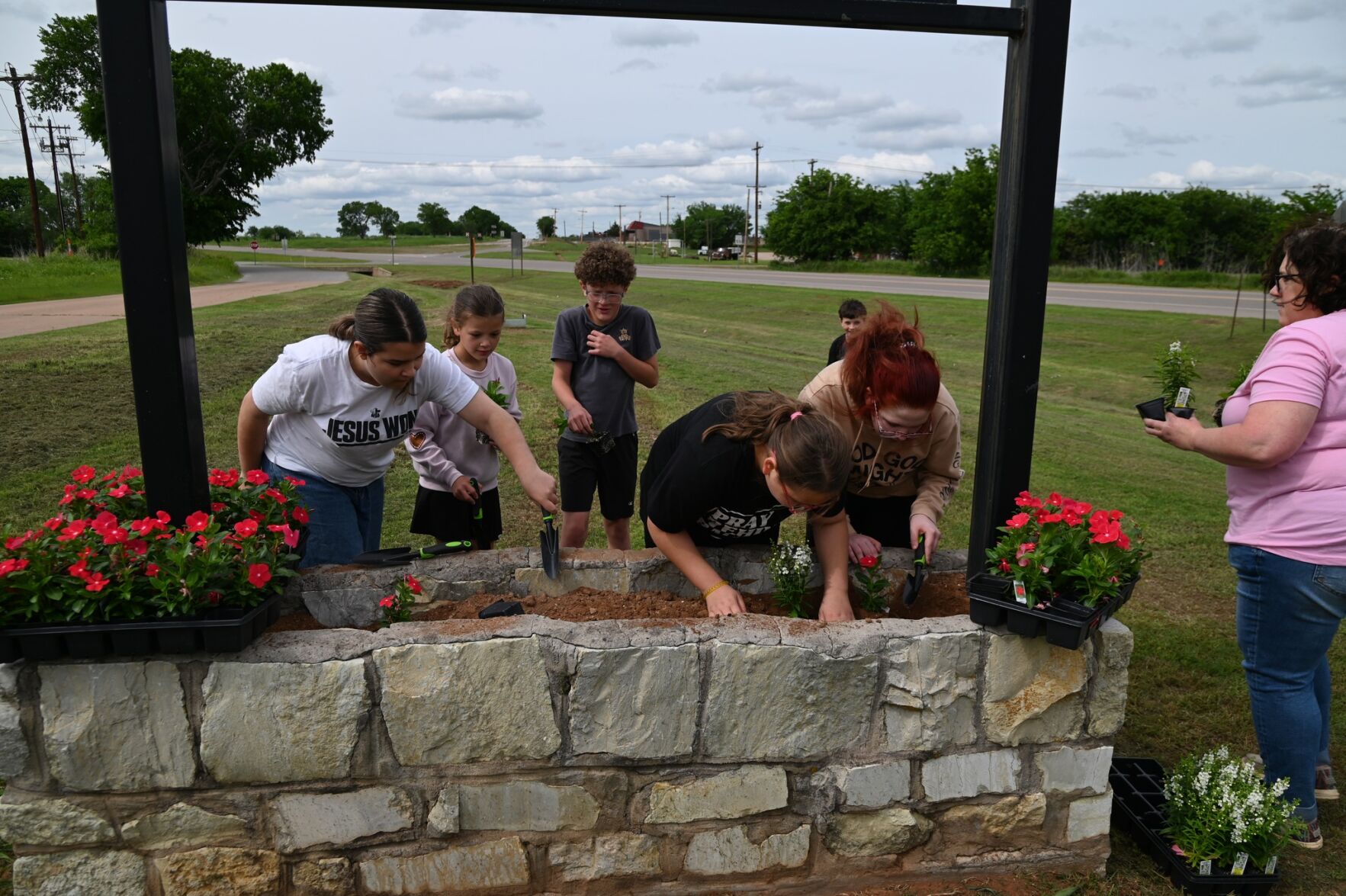 Dig, plant, grow: Comanche youth plant seeds of kindness | Community ...