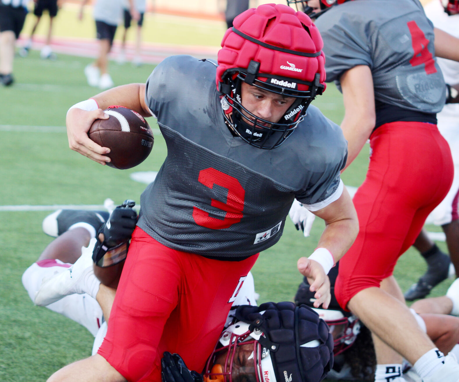 Demons football shows out in lone scrimmage before season begins ...