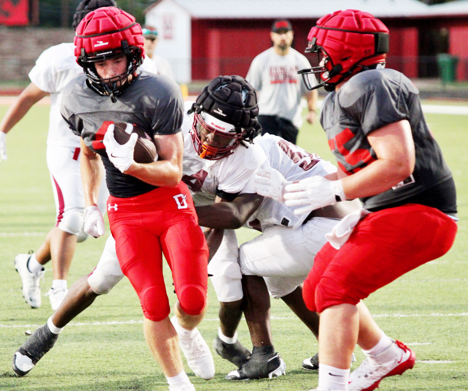 Demons football shows out in lone scrimmage before season begins ...