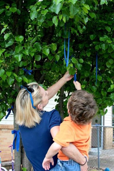 Blue ribbons symbolize hope for abused children | News | duncanbanner.com