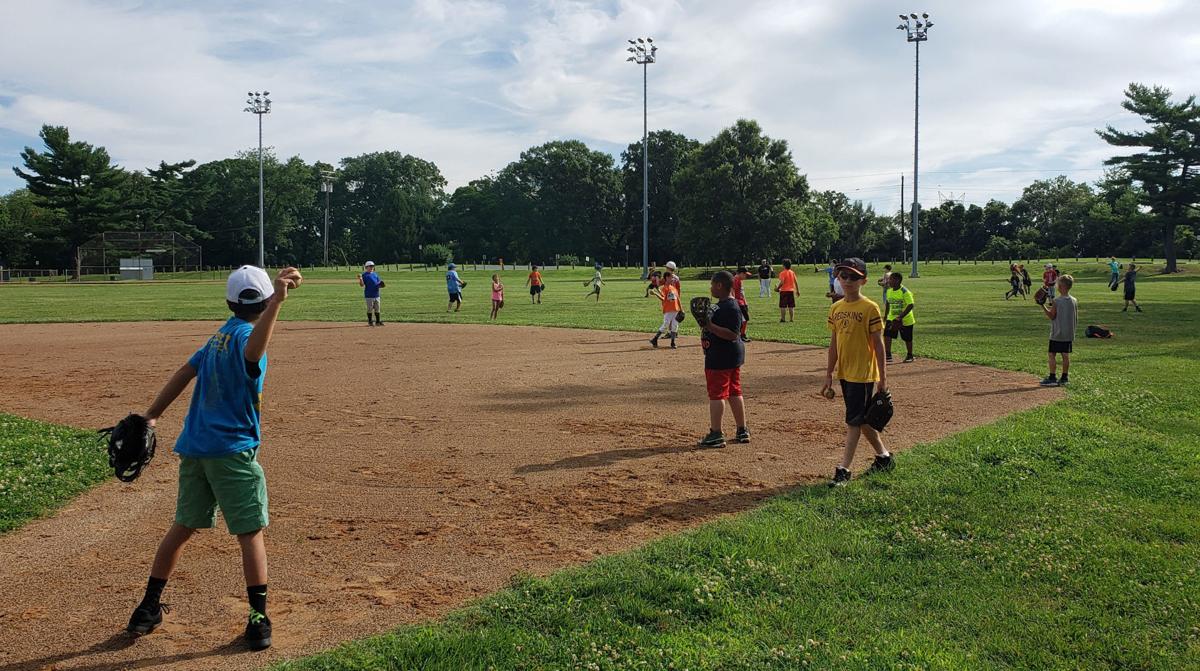 Police Baseball Camp teaches skills and fundamentals to area youth ...
