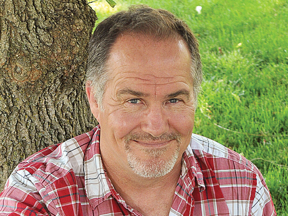 VIEW FROM THE PORCH - Poignant symbol in a hat on a tree