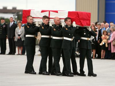 Twilight tribute to three fallen soldiers