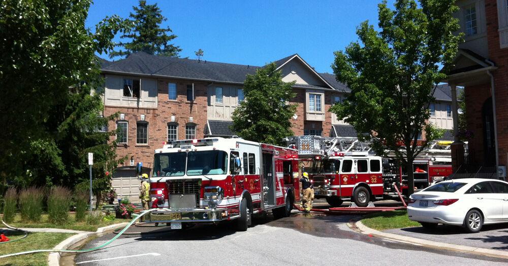 Whitby firefighters battle townhouse blaze