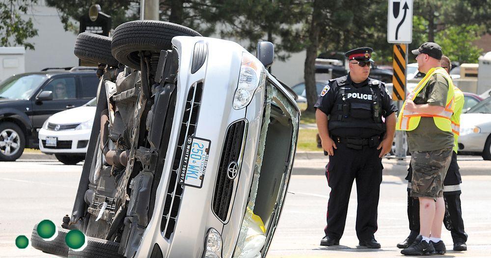 Woman trapped after car flips in Whitby collision